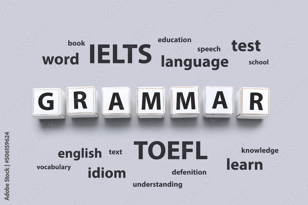 Text GRAMMAR made of cubes and different words on grey background ...
