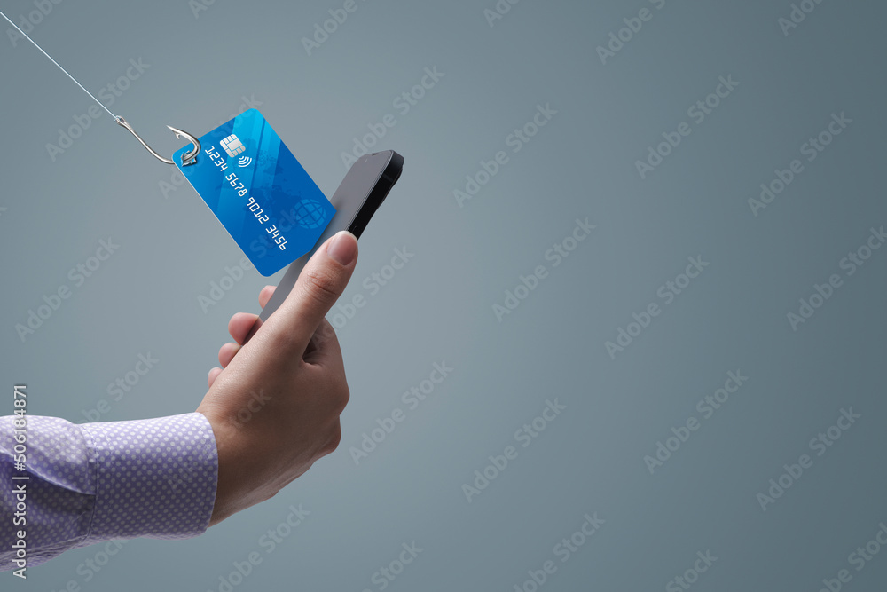 Hacker stealing credit card information on a smartphone Stock Photo ...