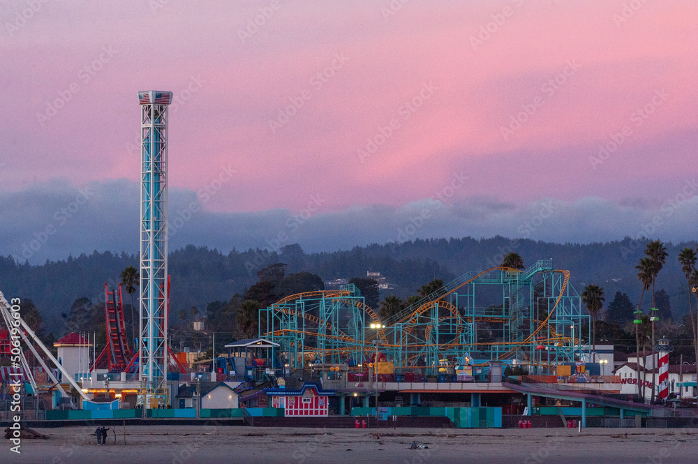 Santa Cruz, Ca - January 6, 2022. A deep pink sky is visible behind the ...