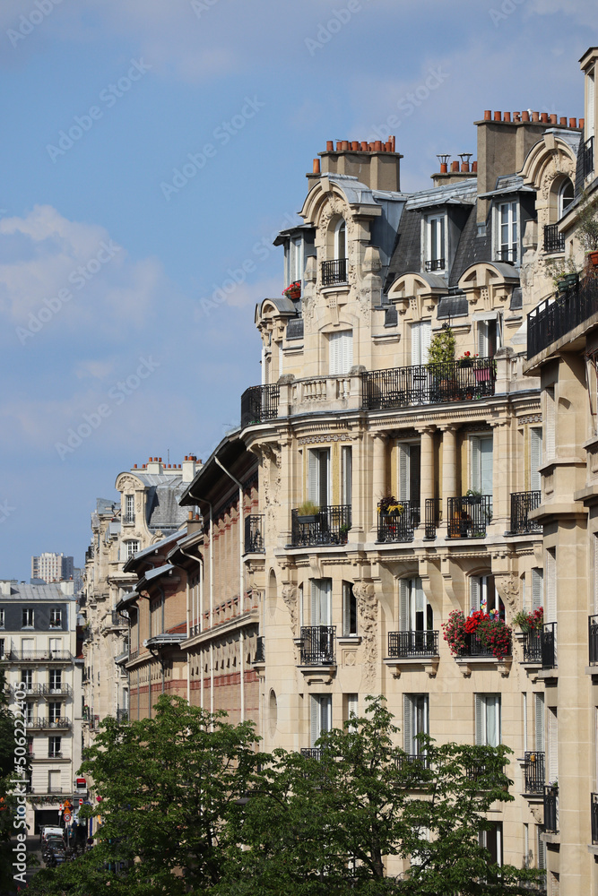 The famous Parisian attics (mansard roofs) on the top floors of 19th ...