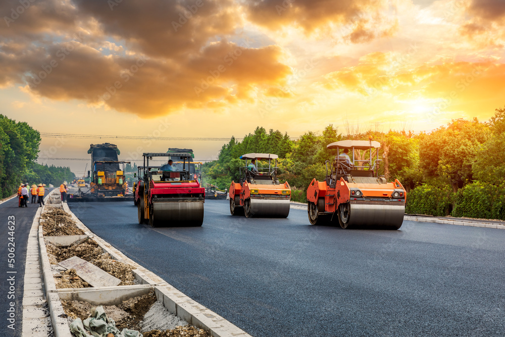 Construction site is laying new asphalt pavement. road construction ...