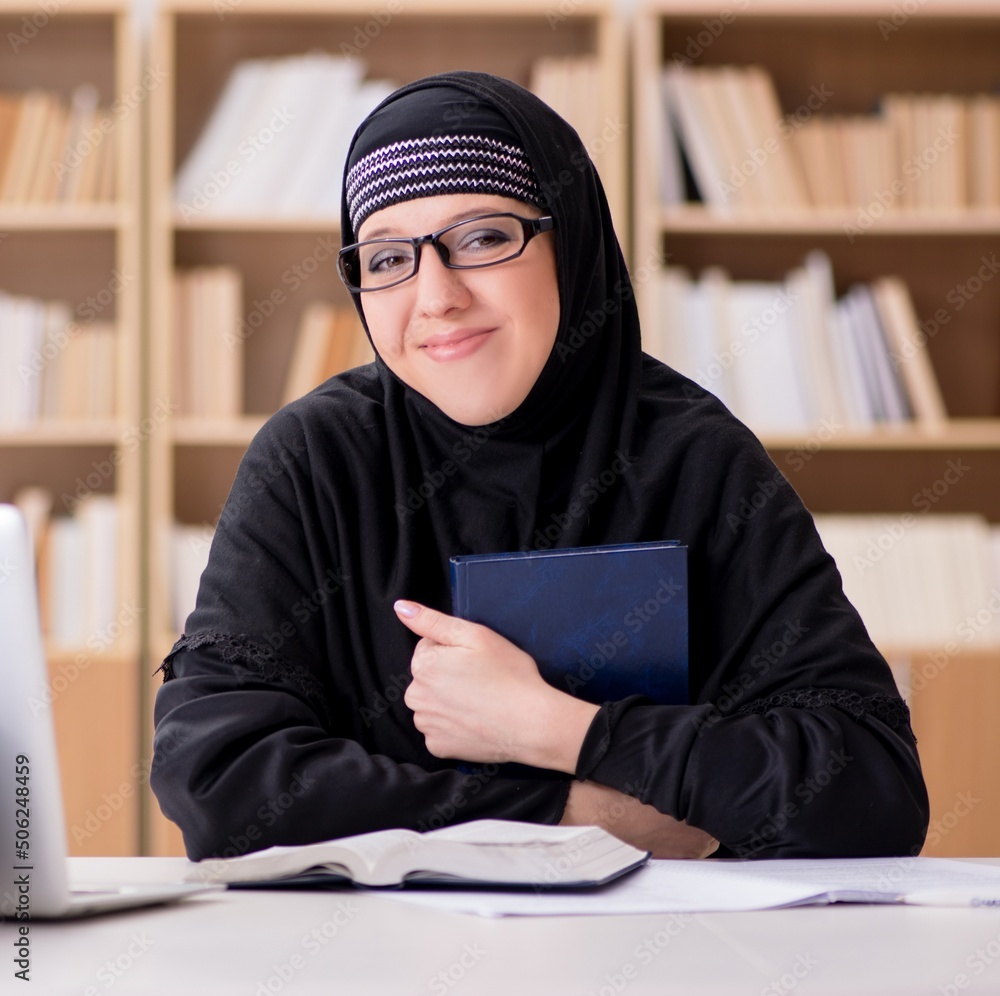 Muslim girl in hijab studying preparing for exams Stock Photo | Adobe Stock