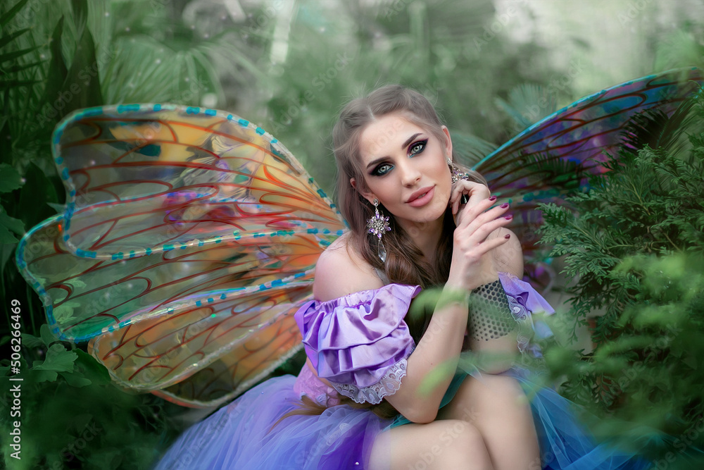 Foto de A beautiful woman is a little cute fairy with butterfly wings ...