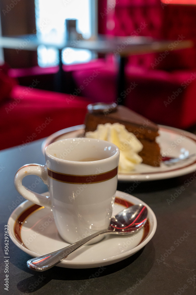 Small cup of black espresso coffee served in traditional cafe in Vienna ...
