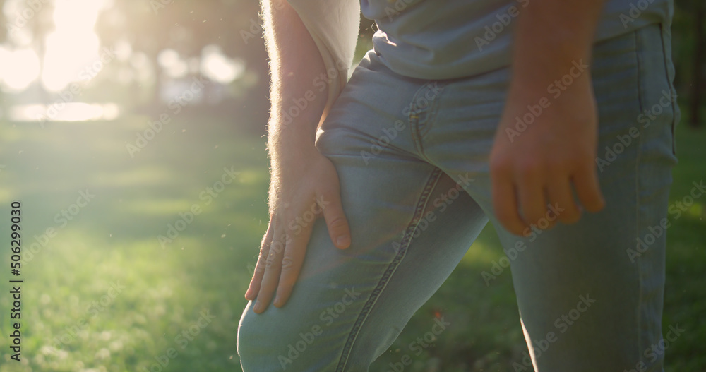 Owner call pet raising arm in park. Man hand patting on leg closeup ...