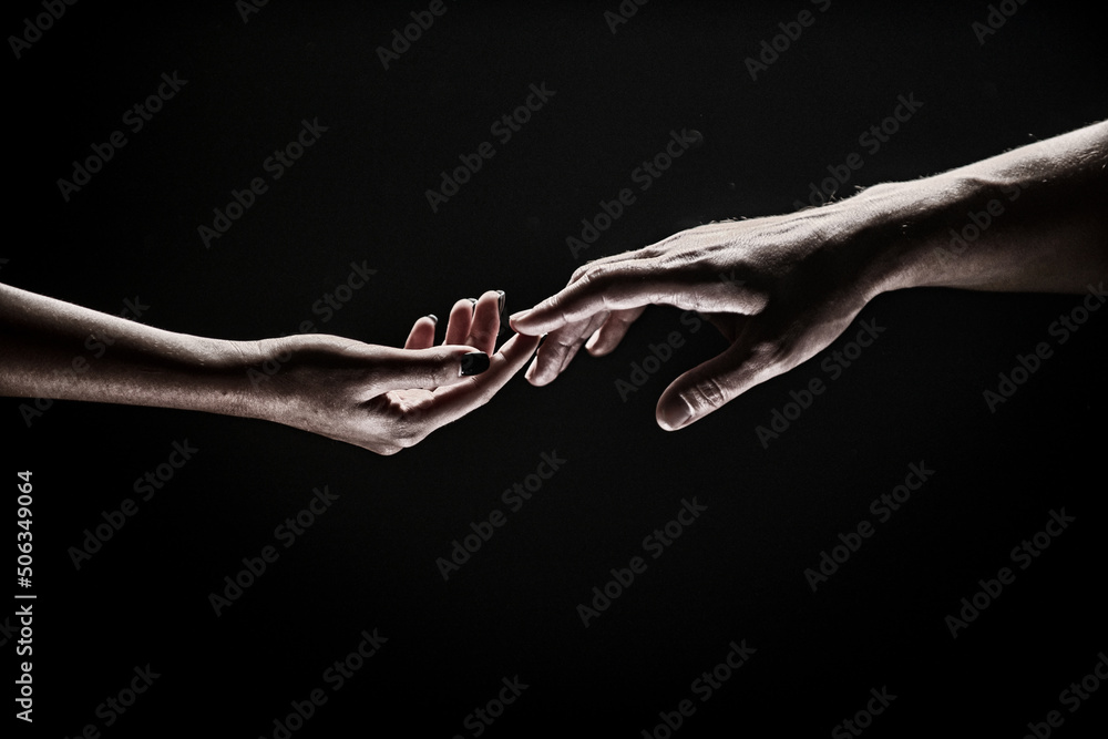 Romantic touch with fingers, love. Two hands stretch each other, black ...