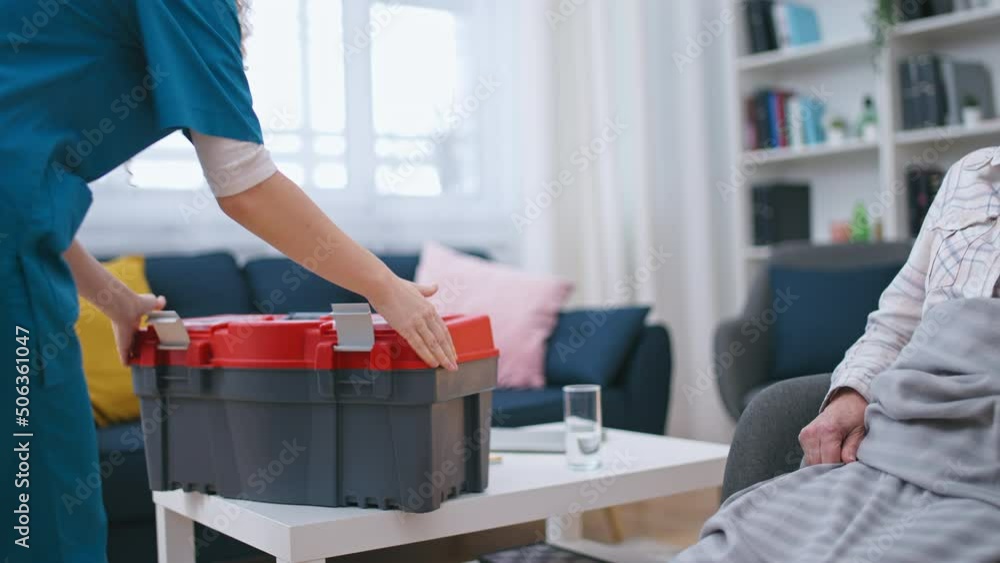 Emergency doctor examining patient with heart failure, first medical ...