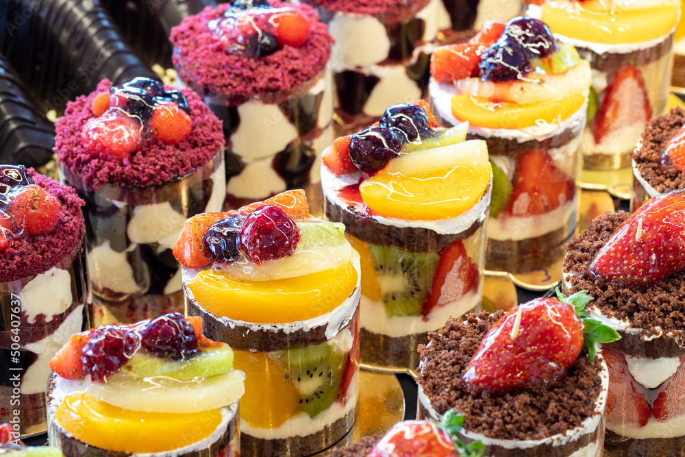 Types of cakes. Cakes on display at the patisserie counter. close up ...