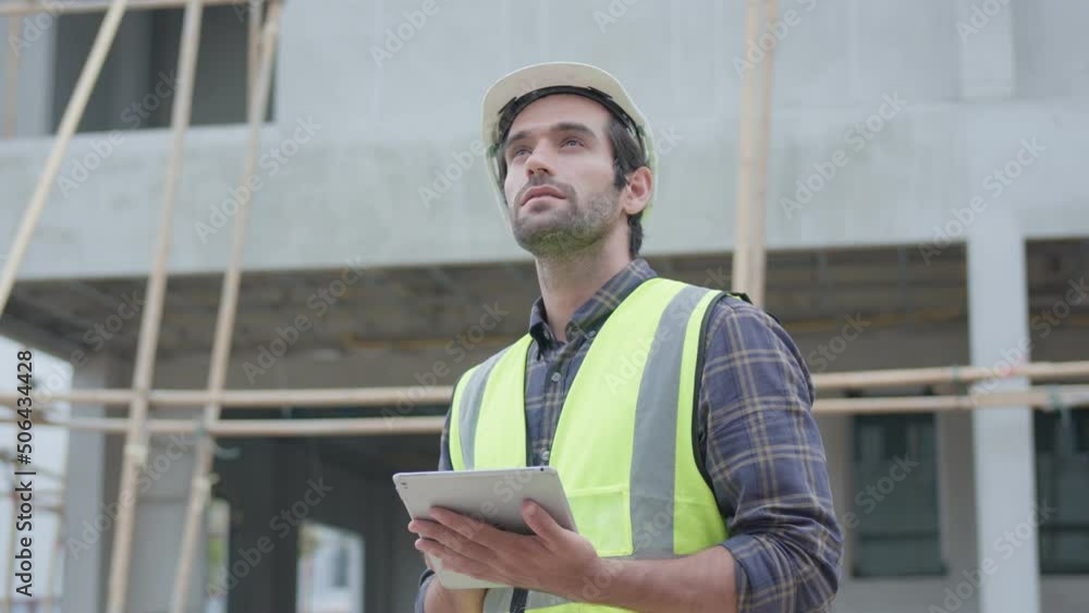 Professional male civil engineer or architect wear safety helmet. While ... Professional male civil engineer or architect wear safety helmet. While ...