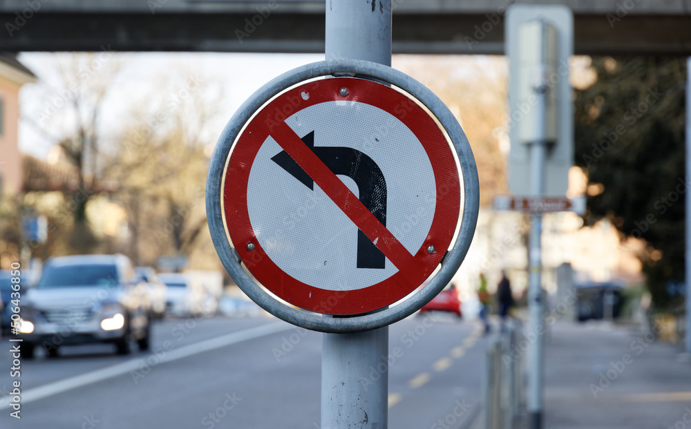 old damaged traffic sign, no left turn, black arrow on white background ...