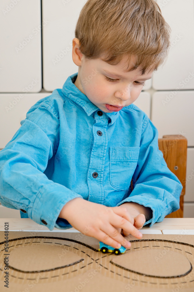 Corrugated carton race track. follow the lines. Implement for children ...