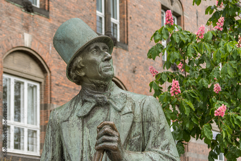bronze bust of the danish writer H C Andersen, sitting in front of a ...