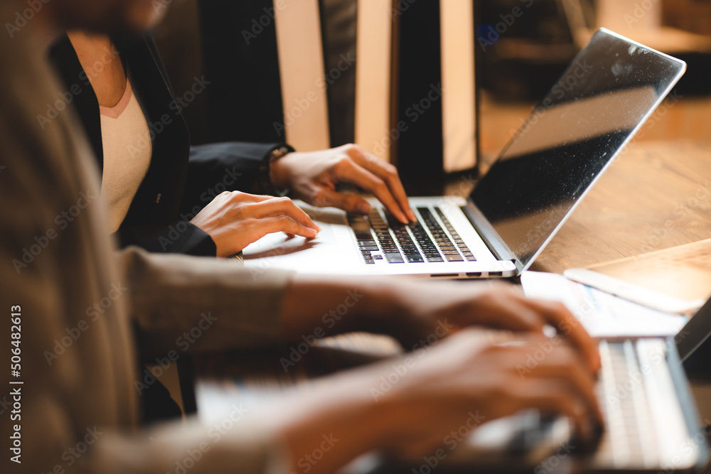 professional business person typing on computer laptop desk at office ...