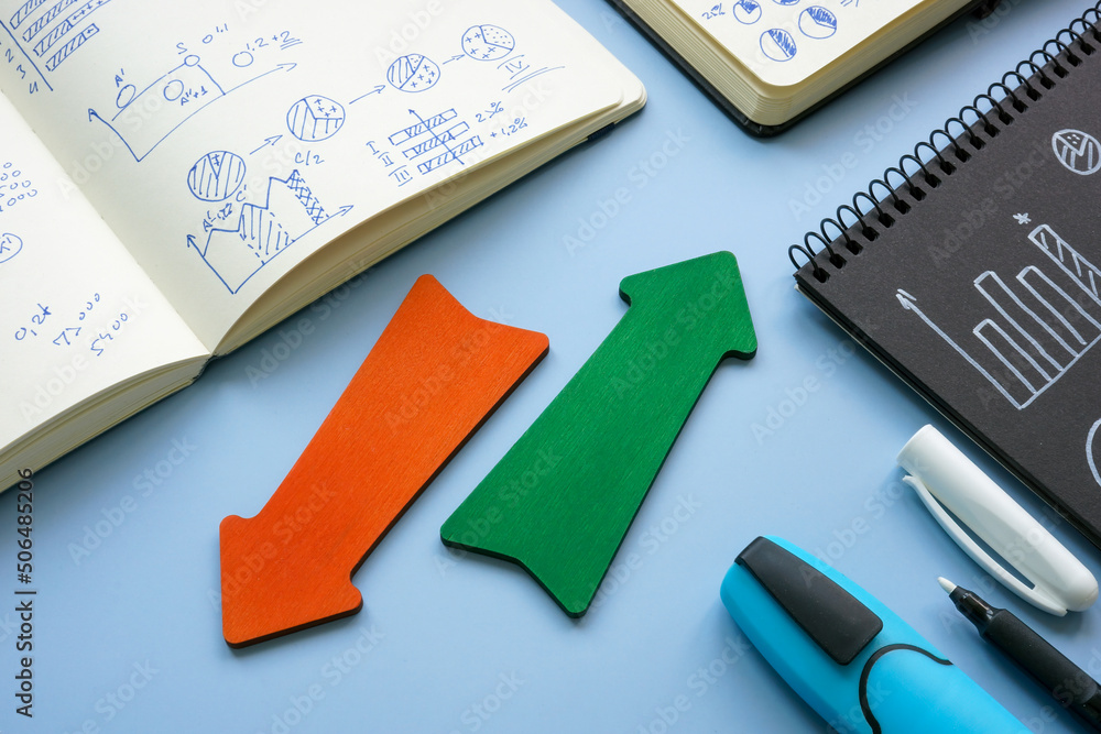 Red And Green Arrows As Symbols Of Trends In Business Stock Photo Red And Green Arrows As Symbols Of Trends In Business Stock Photo