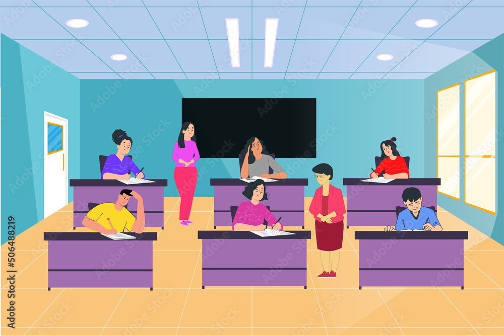 Group of Students doing exam at classroom and two female Teachers are ...