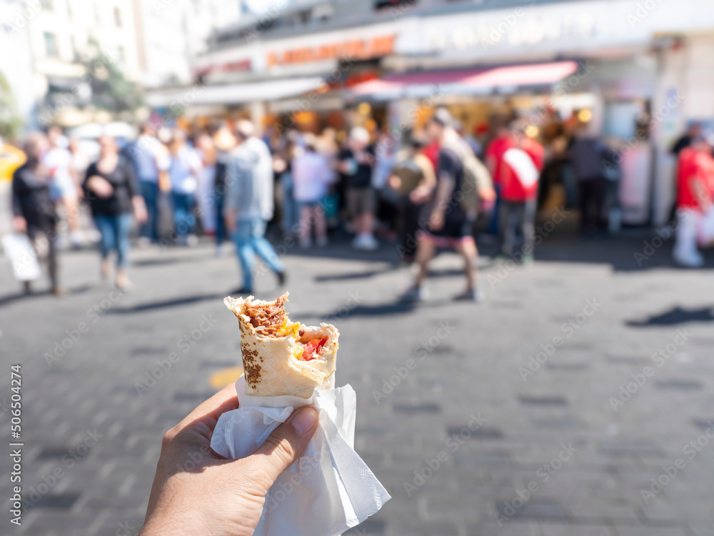 street food doner. hand holding doner food. Selective focus Stock Photo ...