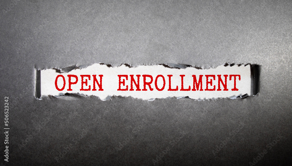 Torn paper with OPEN ENROLLMENT in opening background Stock Photo ...