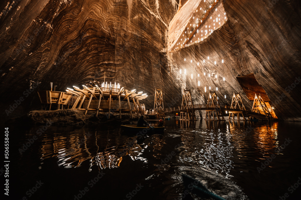 Underground theme park in big salt mine Salina Turda, Turda in Romania ...