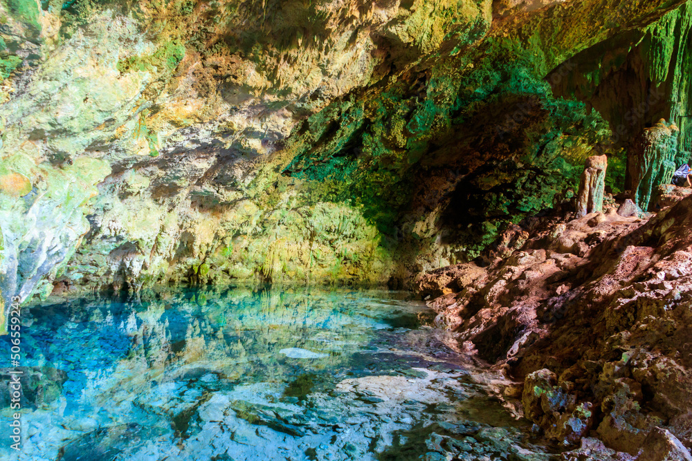 View of beautiful natural pool of crystal clear water formed in a rocky ...