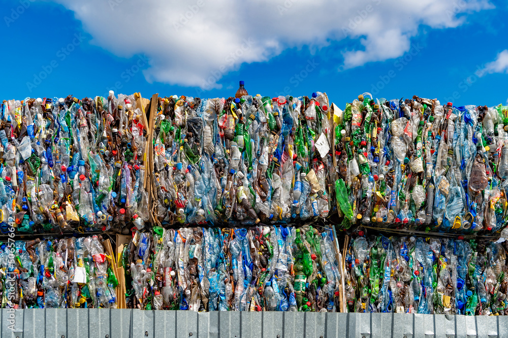 Plastic bottles in bales ready for recycling. Sale, collection of ...