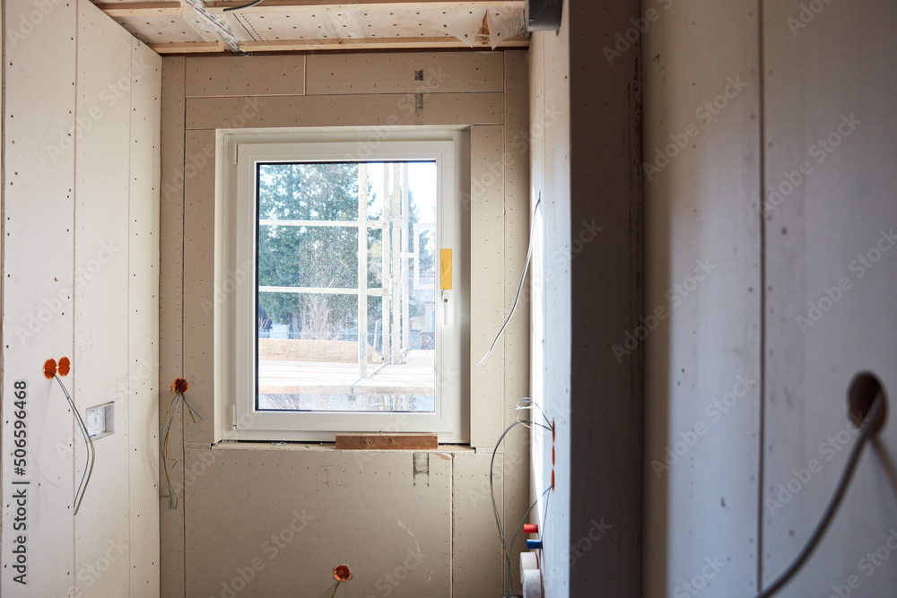 New window in construction site when building a house from a new ...