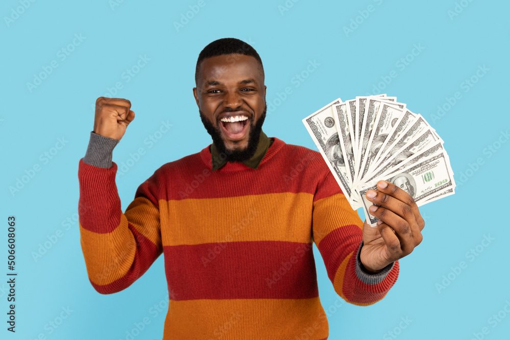 Joyful Black Man Holding Dolar Cash In Hands And Exclaiming With ...