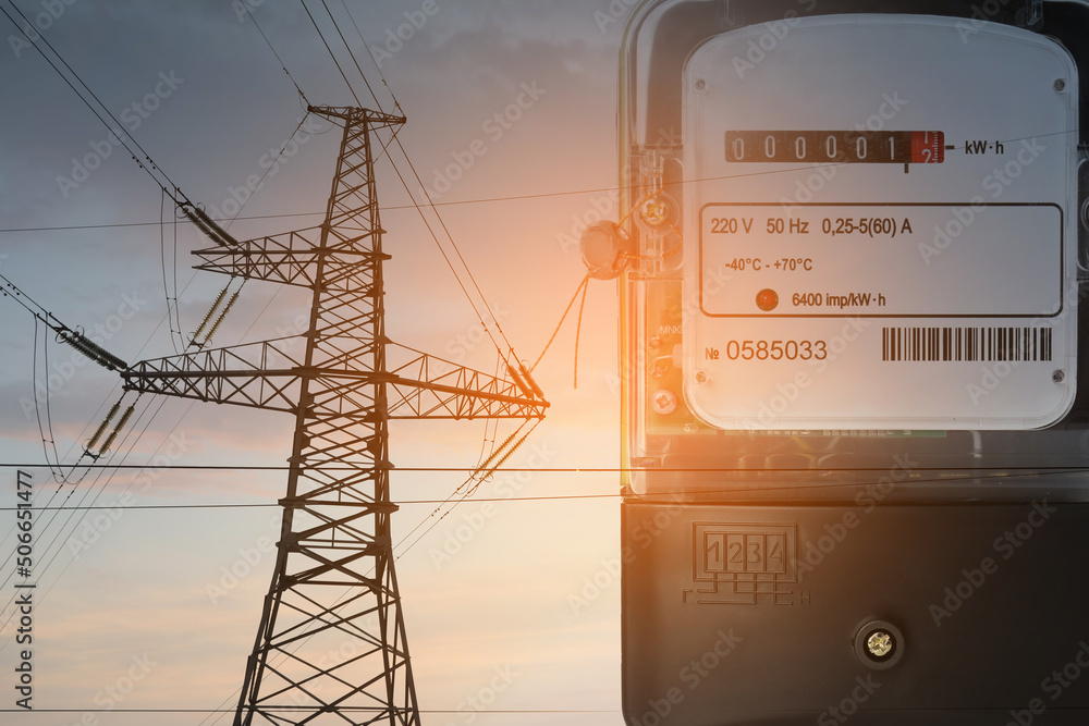 Double exposure of electricity meter and high voltage tower with ...