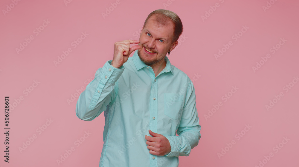 Need some more, please give me. Man showing a little bit gesture with ...