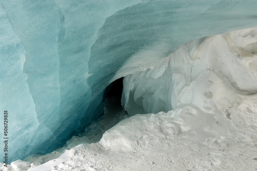 Svalbard. Snow in late spring. Midnight sun. Snowmobiles and Boats. Sun ...