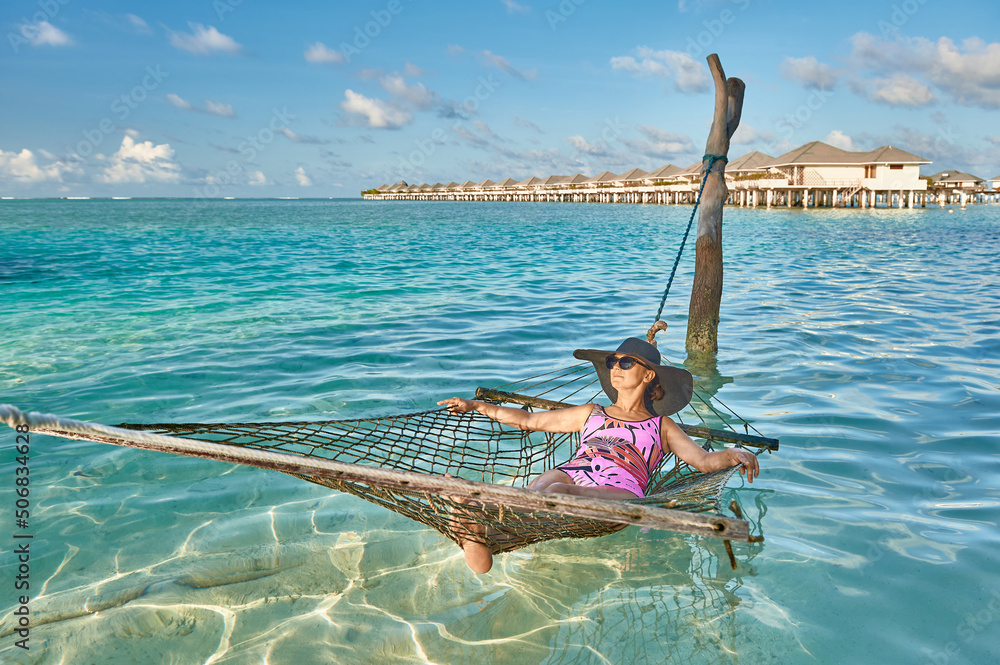 Beautiful girl on the background of the sea and sandy beach. Beaches in ...