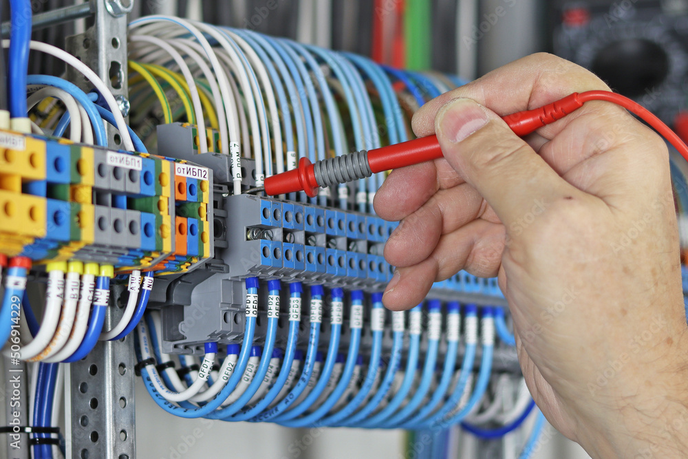 Measuring probe in the engineers hand to determine the parameters in ...