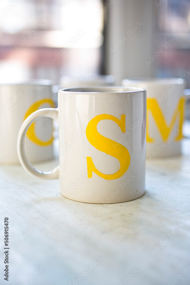 Coffee Mugs with letters Stock Photo | Adobe Stock