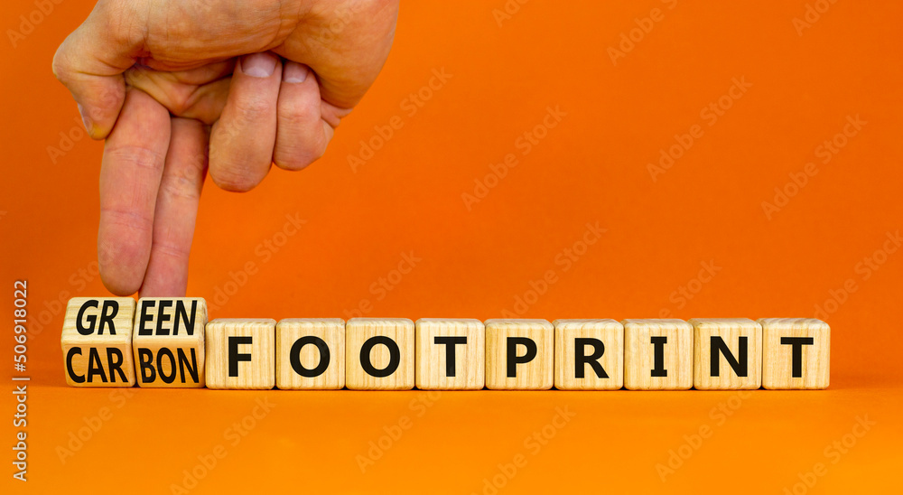 Green or carbon footprint symbol. Businessman turns cubes and changes ...