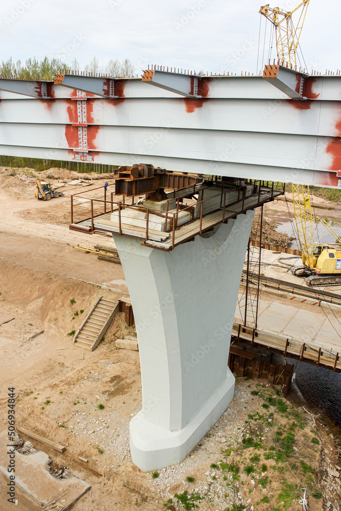 Massive metal structures of the new bridge on a reinforced concrete ...