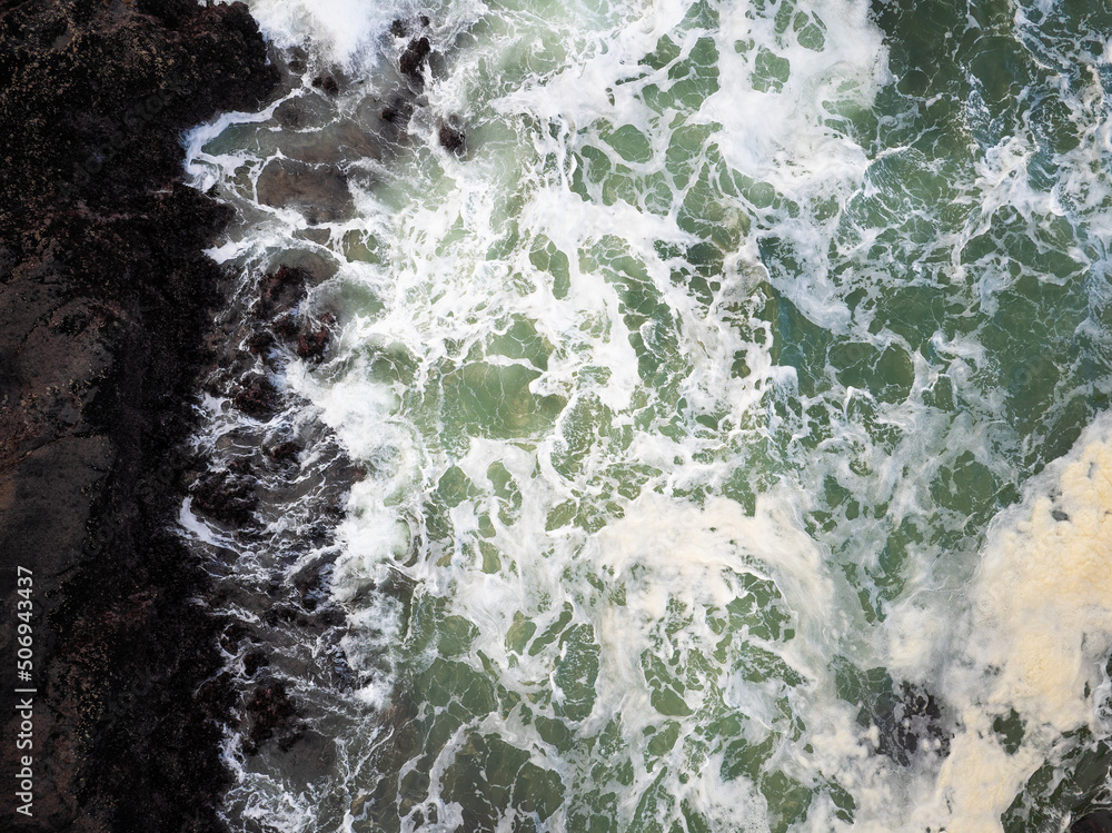 Aerial view of foamy white water surface. Storm in the sea. Bubbling ...