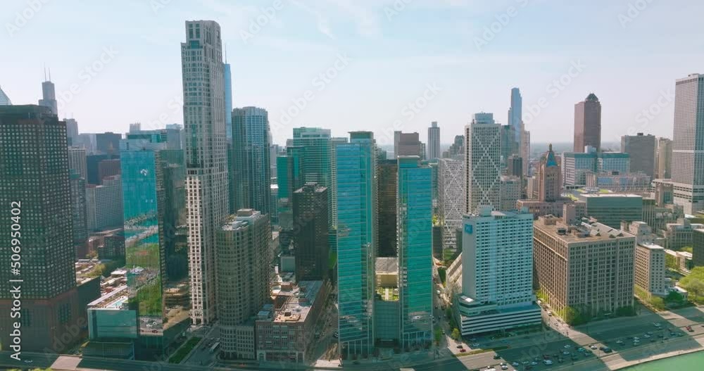Chicago skyscrapers at the waterfront of Lake Michigan. Blue water and ...
