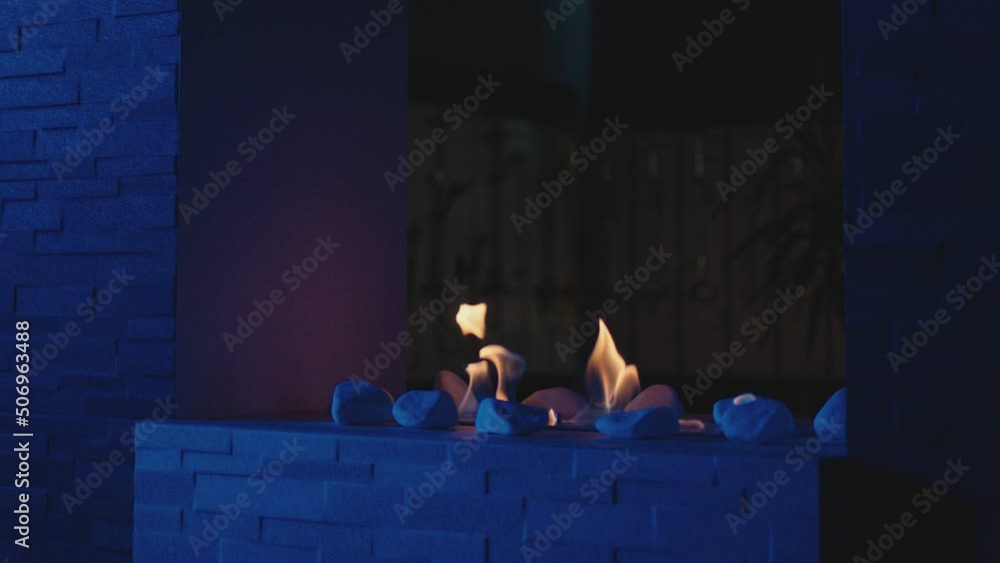 Fireplace inside cozy beautiful modern house . White brick wall ...