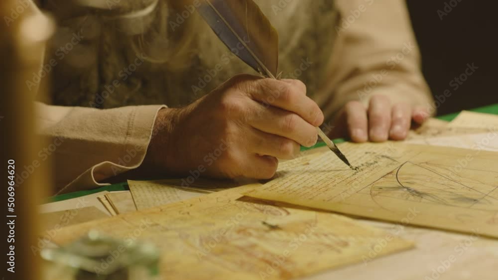 Video „Old man with beard dressed like Leonardo Da Vinci writing ...