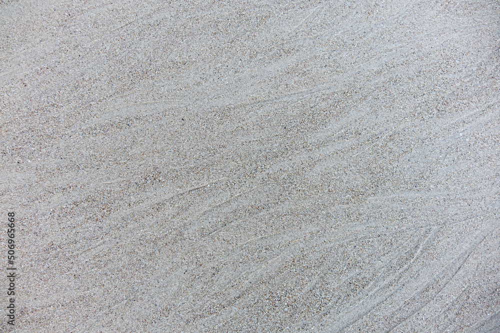 Sand background and texture. Wet beach sand texture after low tide ...