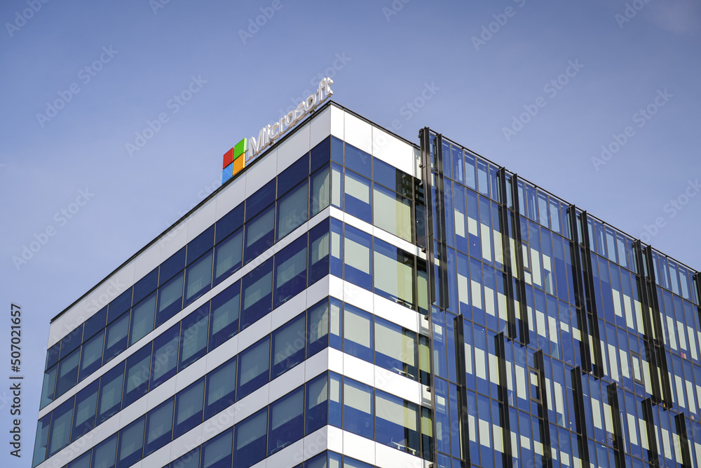 Logo sign of Microsoft company headquarters office building. American ...