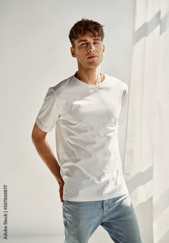 Handsome male model isolated on white background Stock Photo | Adobe Stock