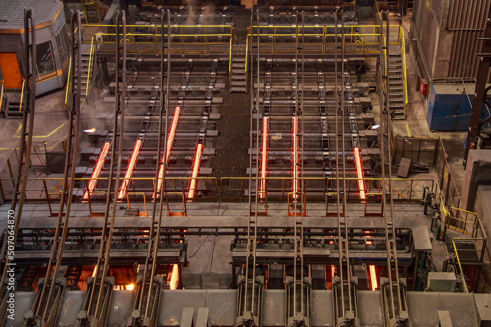 Hot steel billets in continuous casting machine. Stock Photo | Adobe Stock