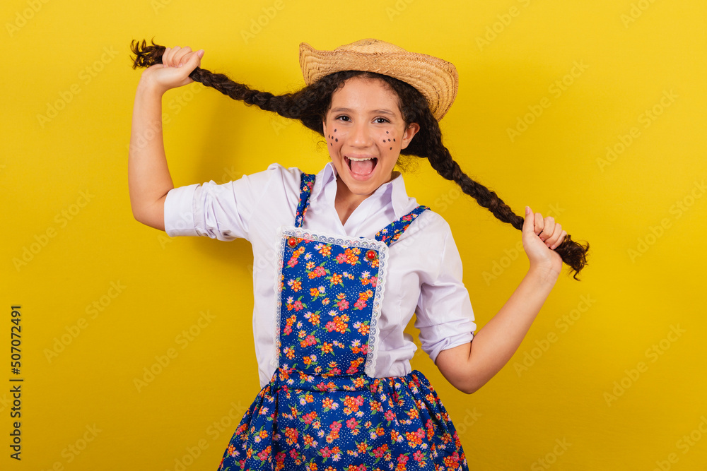 Girl wearing typical clothes for Festa Junina. Showing festa junina ...