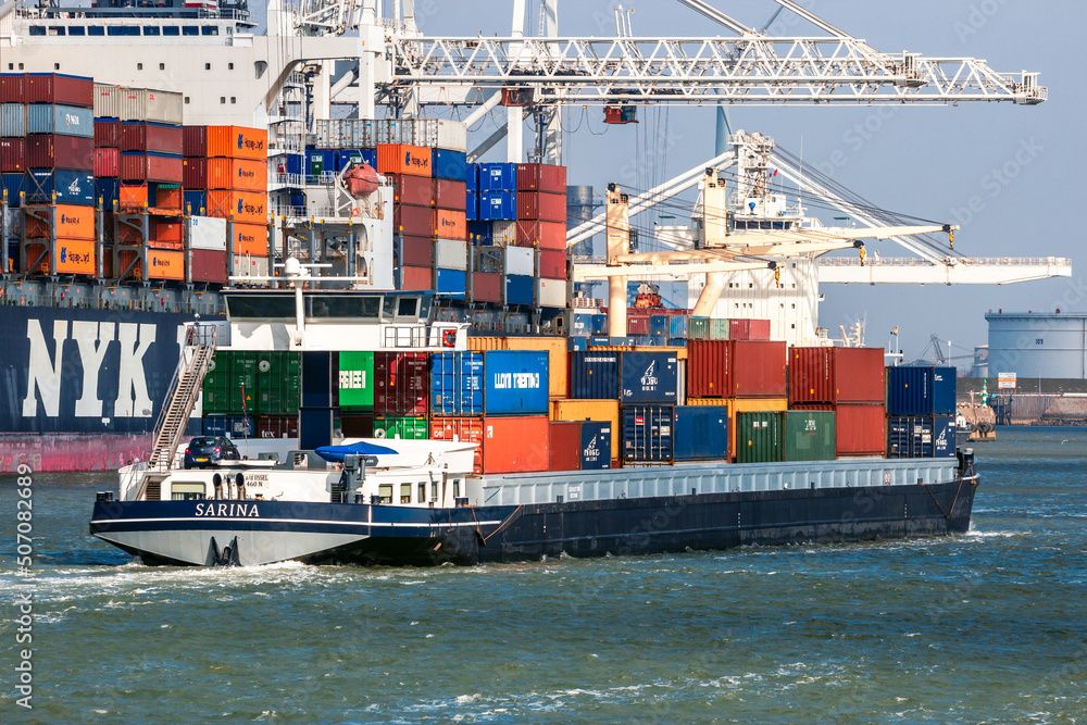 Shipping container barge ship the Port of Rotterdam. Stock Photo ...