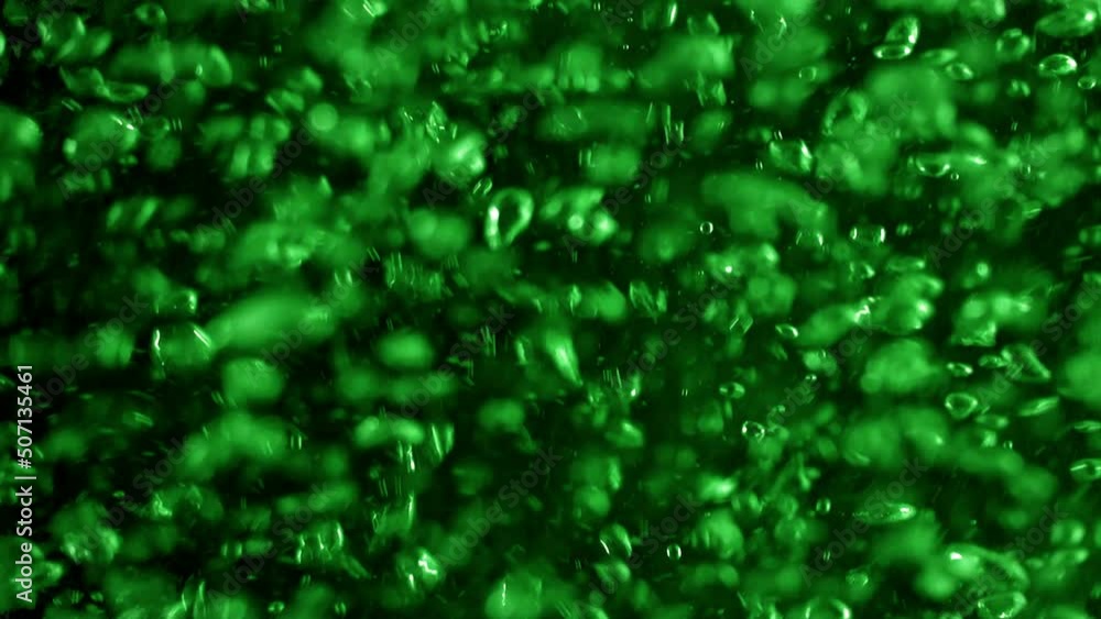 full-frame green sparkling rising carbonated gas bubbles background ...