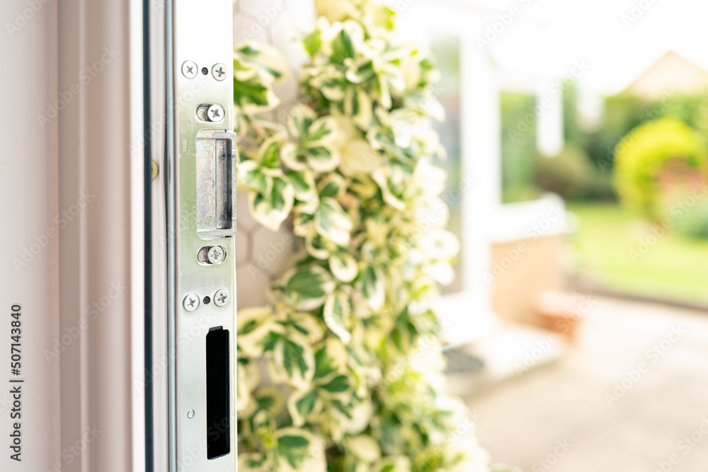 Shallow focus of the metal locking slots seen on a newly fitted kitchen ...