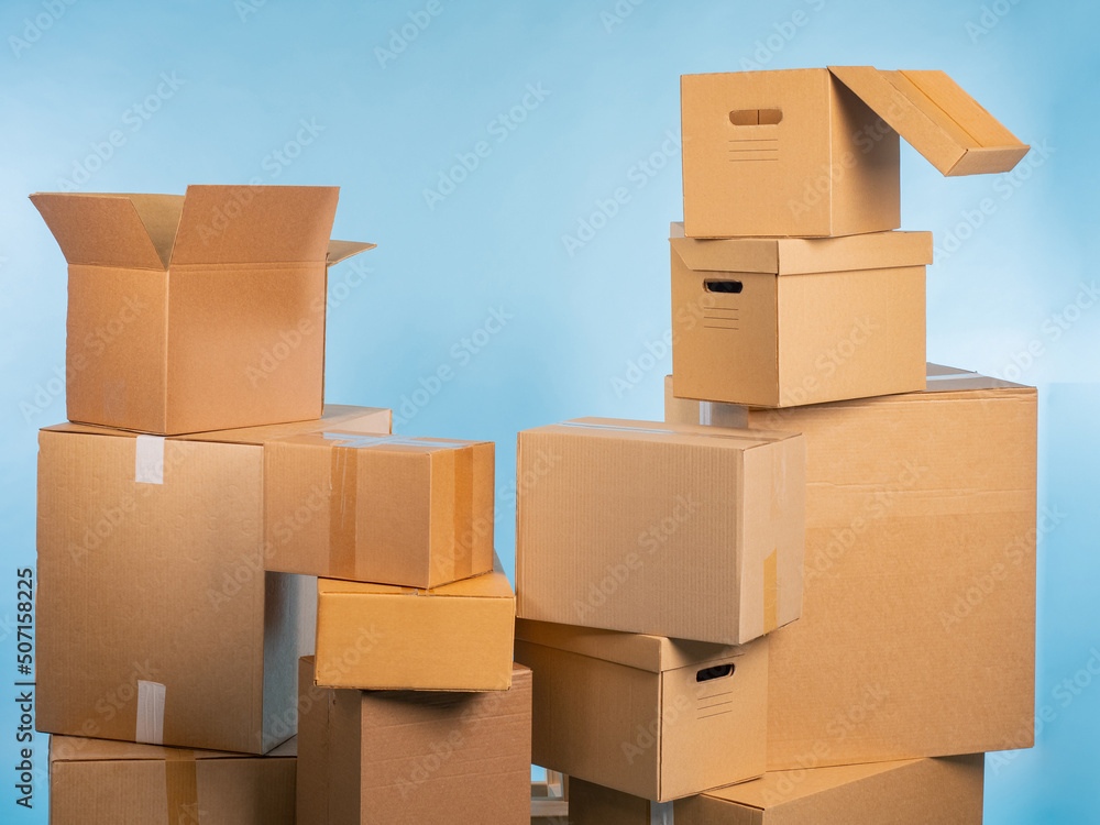 Cardboard boxes of different sizes. Lots of boxes for packing parcels ...