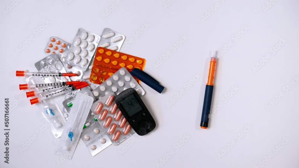 Pile of medicines on white background. Tablets and capsules that ...
