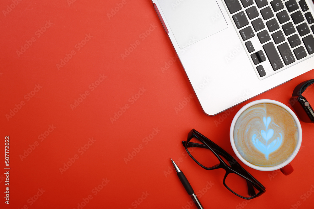 Top view office table desk red background,computer keyboard and other ...