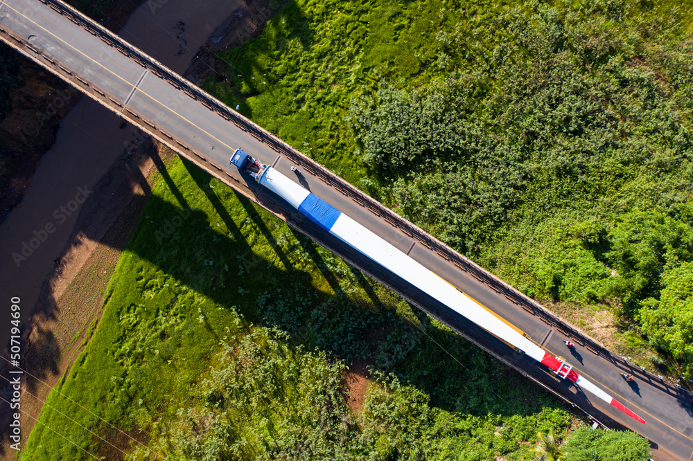 Aerial view of long vehicle truck with special semi-trailer for ...
